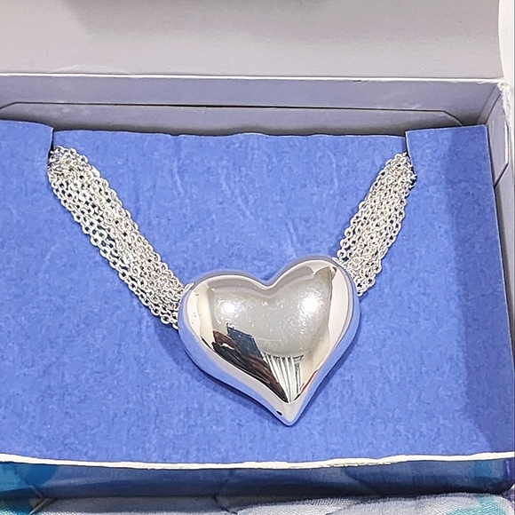 Avon | Jewelry | Rare Find Avon Puffy Heart Necklace Shiny Silver Toned ...